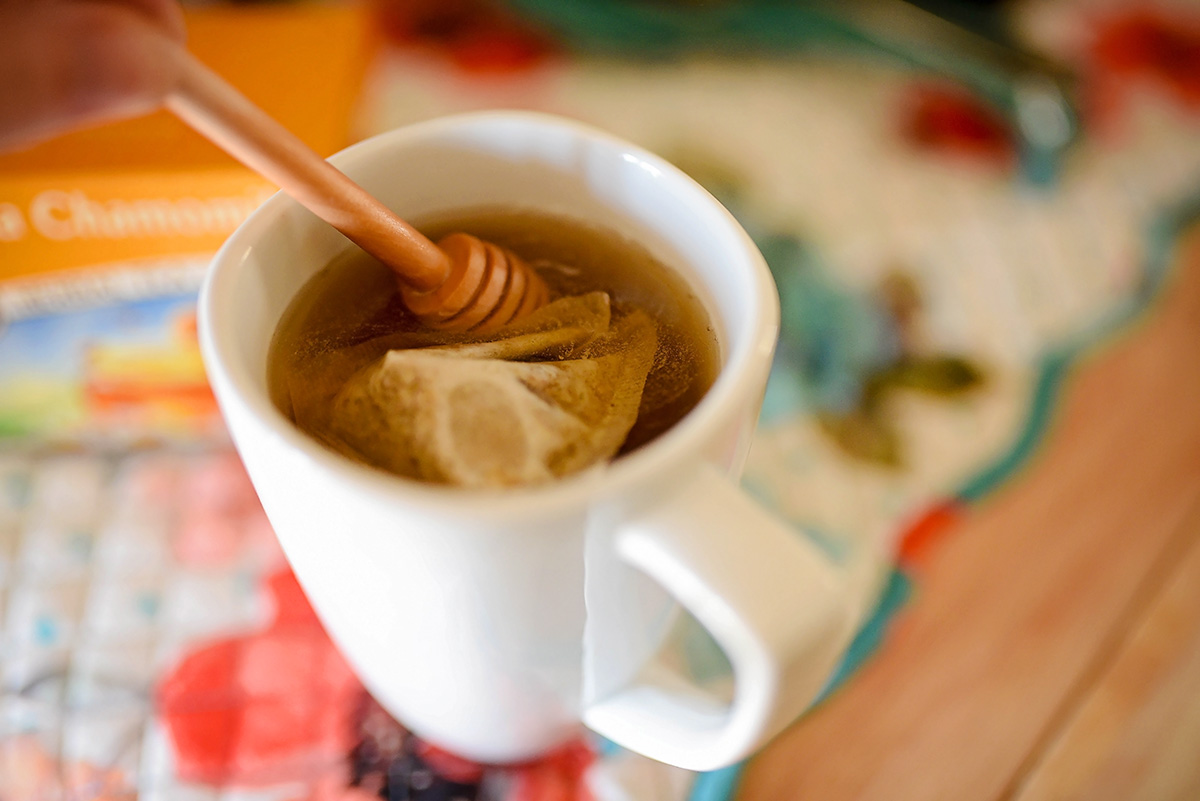 stirring hot tea - Sarah Halstead