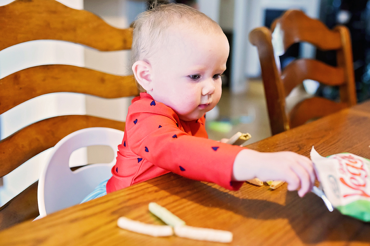 annie grabbing veggie straw - Sarah Halstead